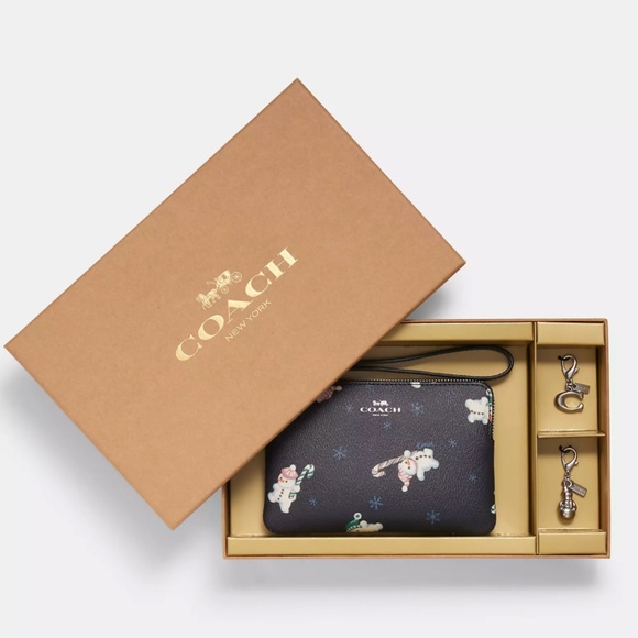 Coach | Bags | Coach C74 Boxed Corner Zip Wristlet With Snowman Print ...